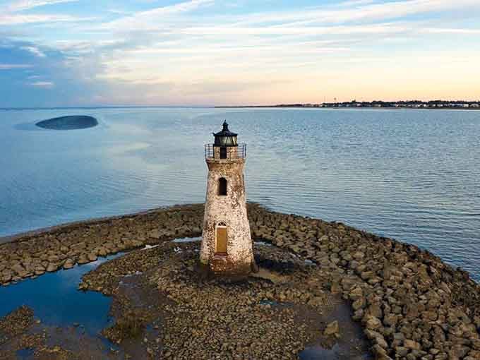 Sunset casts long shadows across the jetty, turning an ordinary evening into a photographer's dream come true.