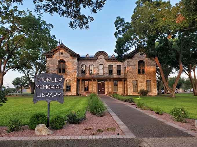 The Pioneer Memorial Library sits like a castle of knowledge, where stone walls hold centuries of community stories.