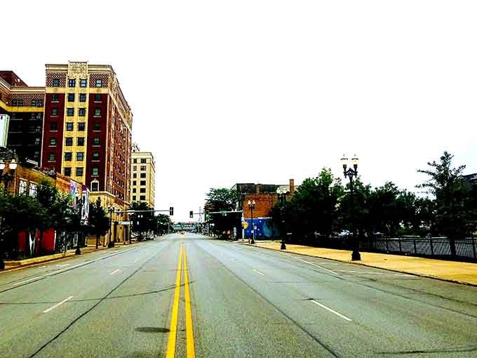 Wide boulevards stretch toward the horizon where urban renewal meets Lake Michigan's promise of better days ahead.