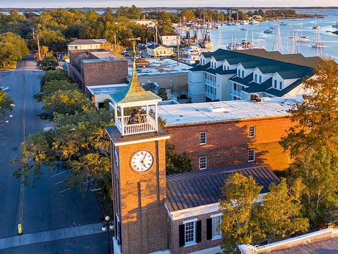 The clock tower stands sentinel over a harbor town that's kept its maritime soul beautifully intact.