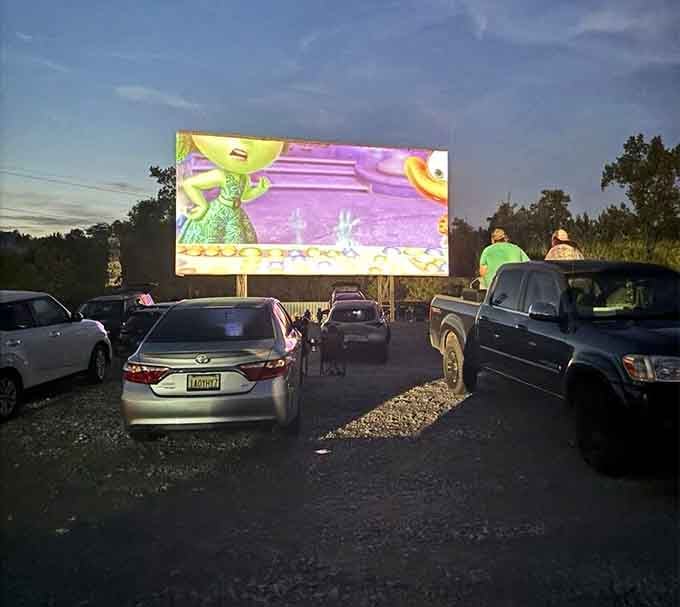 Animated colors dancing across the screen while families settle in&mdash;pure joy captured in one perfect moment.