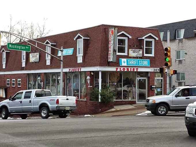 The street-level storefront beckons shoppers with colorful window displays that change faster than fashion trends themselves. Photo credit: <a href="https://maps.google.com/maps/contrib/116680920761325213538" target="_blank" rel="noopener noreferrer">Hana Mission Thrift Store Belleville</a>	The street-level storefront beckons shoppers with colorful window displays that change faster than fashion trends themselves.
