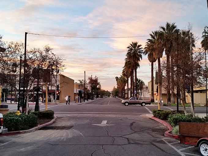 Golden hour transforms ordinary streets into something magical, painting everything in warm, welcoming light that costs nothing extra.