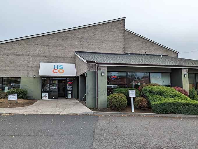 The colorful landscaping and welcoming entrance prove that thrift shopping can feel surprisingly upscale and inviting.