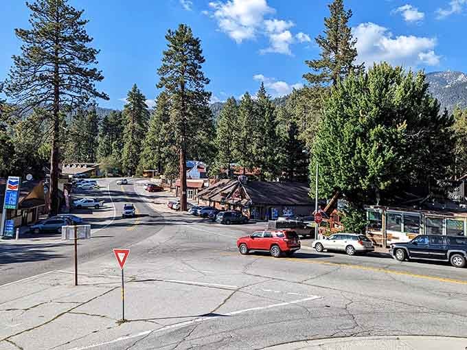 Pine-scented air and rustic buildings create that perfect mountain town vibe where stress melts away like spring snow.