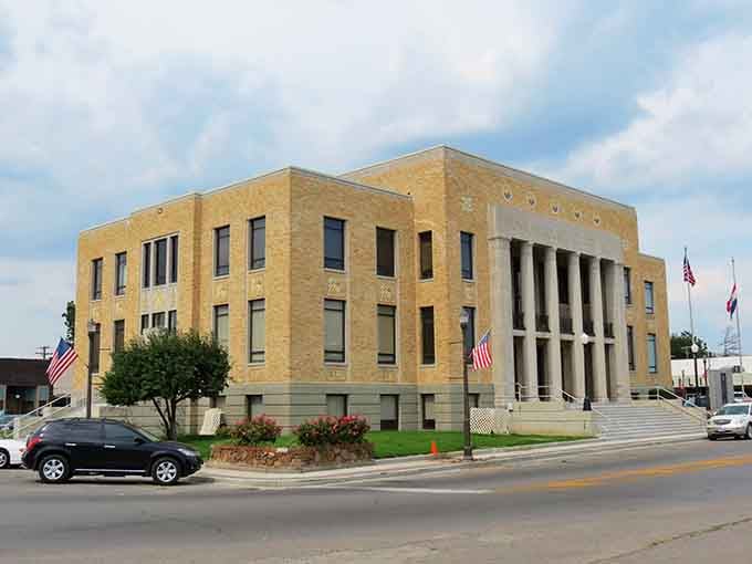 This clean-lined courthouse stands proud under blue skies, representing small-town government without the big-city bureaucracy headaches.