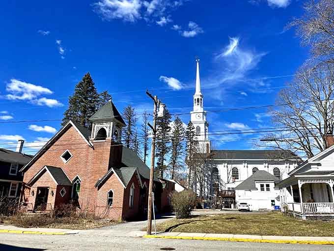 Two churches stand side by side like old friends, their steeples reaching skyward in architectural harmony and grace.