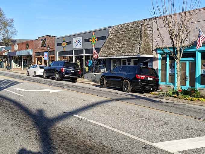 Colorful storefronts line the street like a box of crayons came to life and decided to open shop.