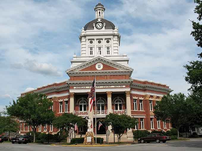 That ornate courthouse dome reaches skyward like a wedding cake topper, commanding attention from every angle in town.
