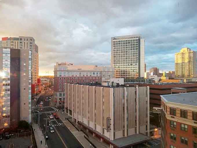 Golden hour paints the urban skyline in warm hues, transforming everyday architecture into something almost magical to witness.