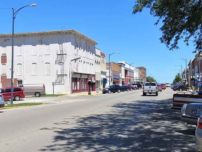 The storefronts line the street, showcasing a town where history and modern life blend seamlessly.