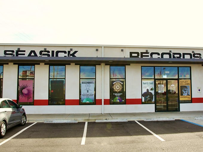 The bold signage cuts through the sky like a guitar solo, impossible to miss and equally impossible to ignore.