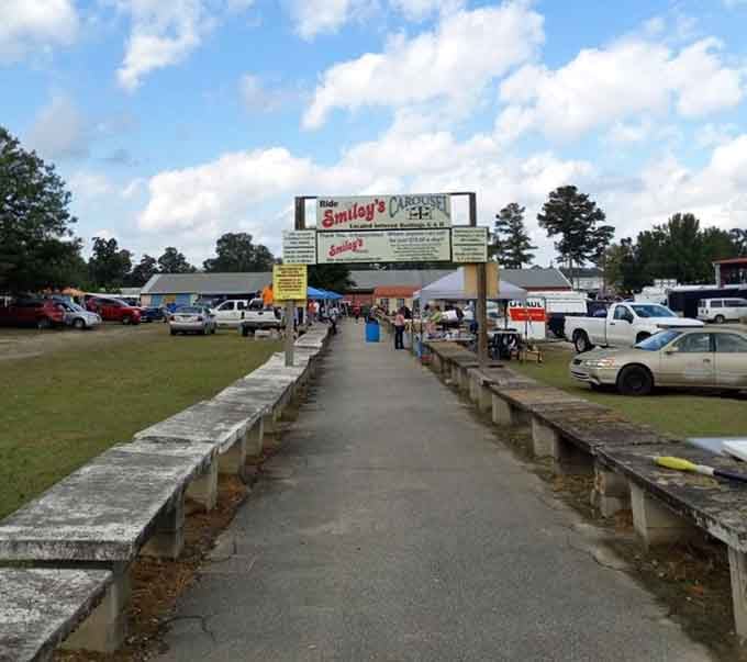 The vintage drive-in marquee points the way to rows of vendors stretching toward the horizon like treasure maps.