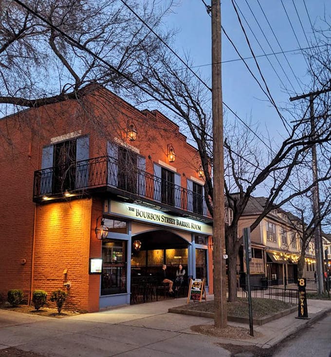 As twilight settles in, the gas lamps flicker to life, transforming this brick beauty into pure dining magic.