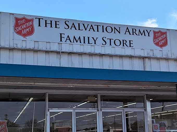 The iconic red shield logo stands proud above this warehouse of wonderful finds and community support.