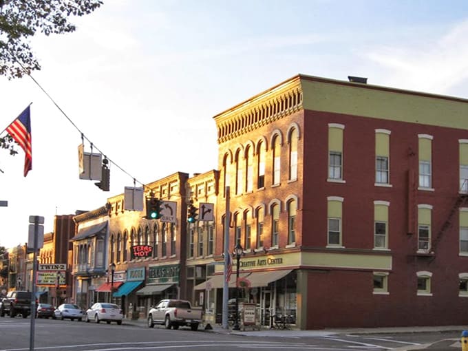 Golden afternoon light bathes these storefronts in warmth, making every stroll feel like a scene from "It's a Wonderful Life."