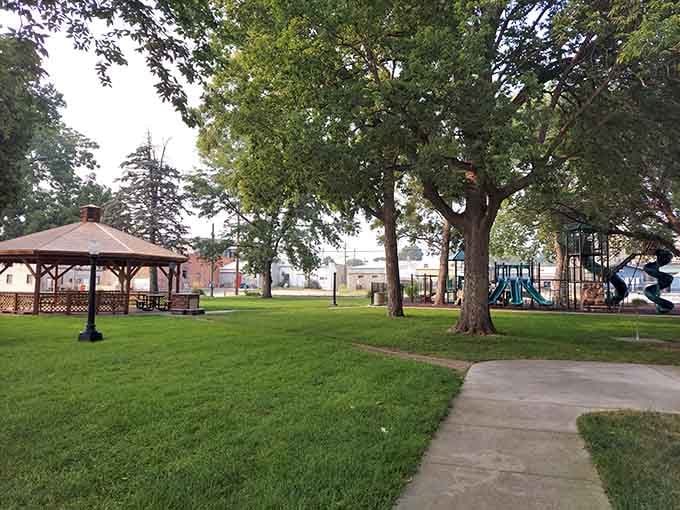The world's largest porch swing awaits beneath this charming gazebo—like a Southern grandmother's front porch on steroids.