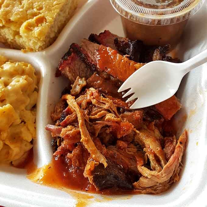 When pulled pork glistens like this, you know someone back there understands the sacred art of low and slow.