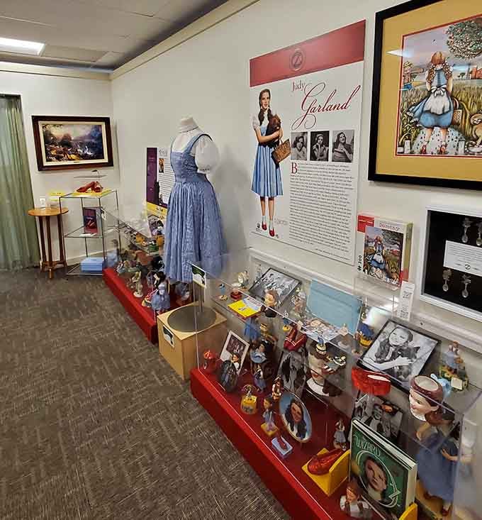 Dorothy's iconic dress and ruby slippers share space with treasures that span over a century of Oz.