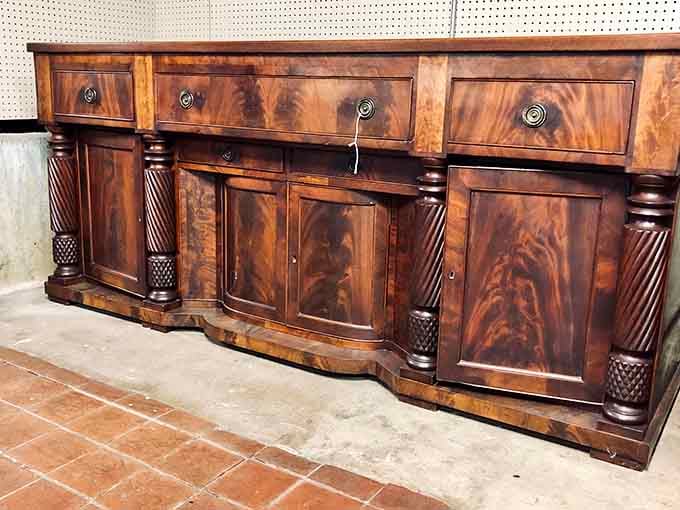 This mahogany sideboard with spiral columns has hosted more dinner parties than a socialite's calendar. Just imagine the conversations it's witnessed!