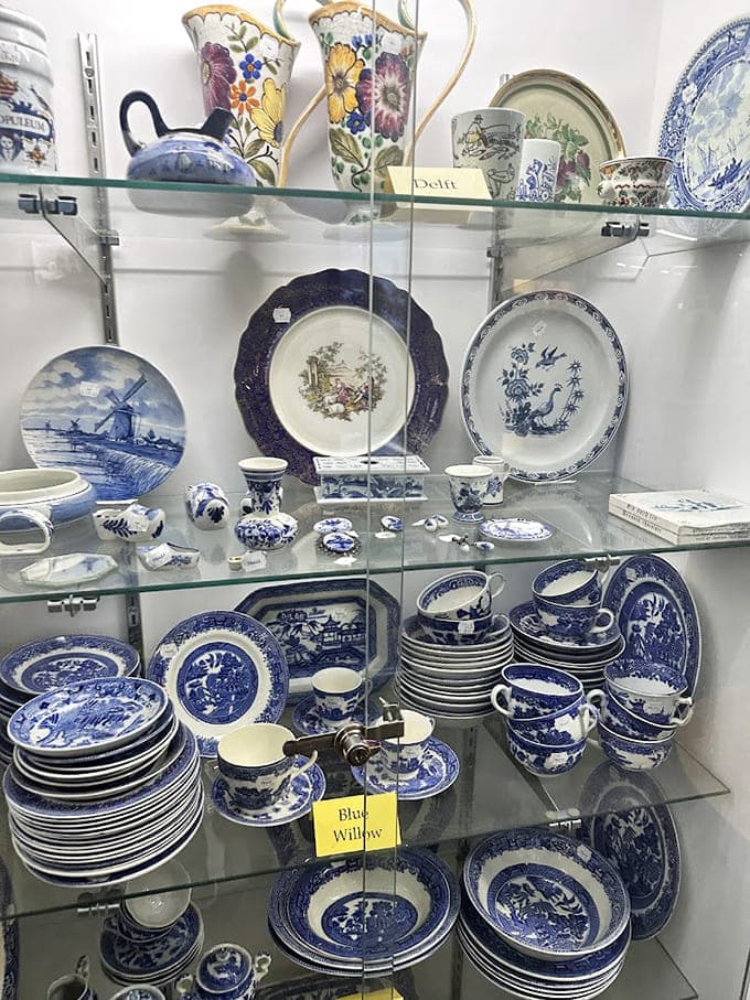 Blue Willow china stacked deep enough to host every grandmother's dream dinner party simultaneously.