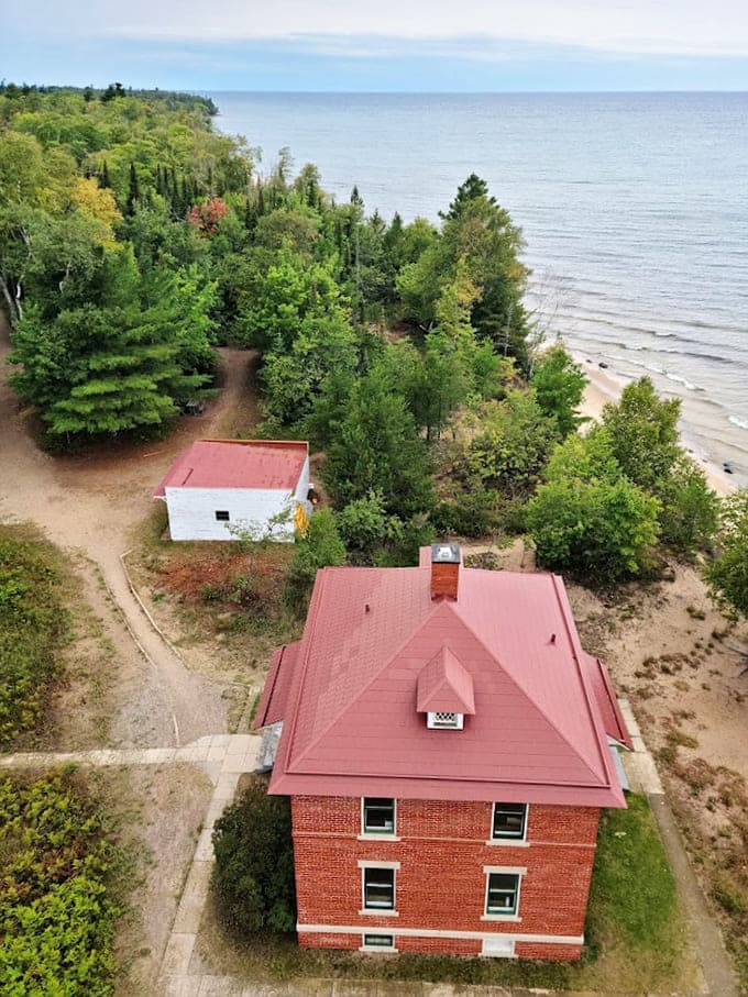 Those red brick keeper's quarters housed entire families who kept the light burning through brutal Superior winters year-round.