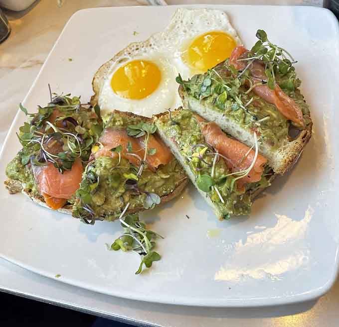 Avocado toast meets smoked salmon and perfectly fried eggs in a breakfast mashup that actually works beautifully.