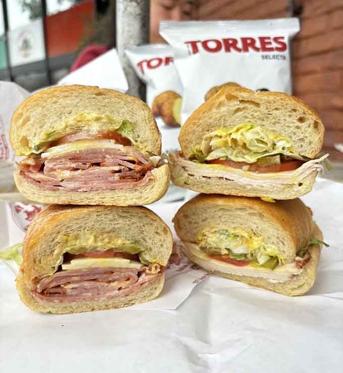Four perfect sandwiches lined up like the Beatles crossing Abbey Road, except these won't break up your appetite.