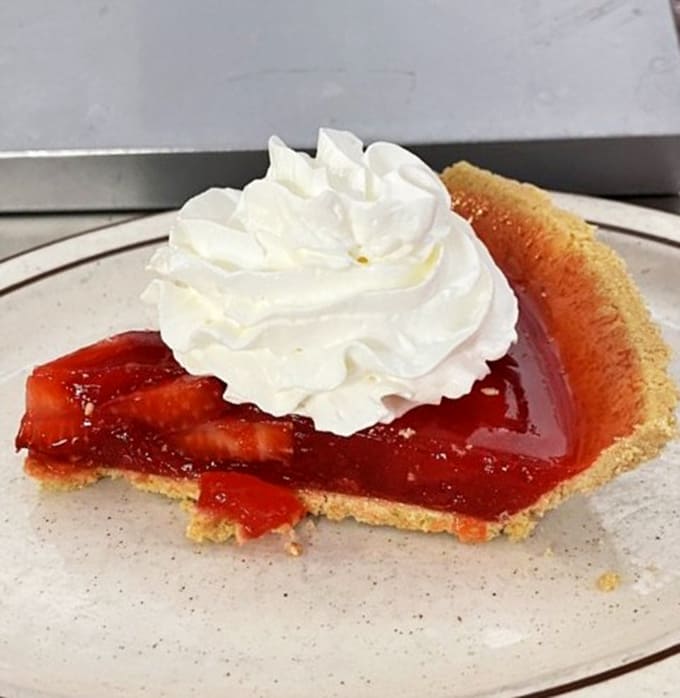 That golden crust and ruby-red filling topped with clouds of whipped cream is what pie dreams are made of, friends.