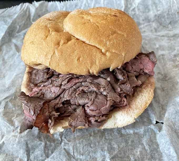 Behold the sandwich that launched a thousand return visits, piled high with tender beef on toasted perfection.