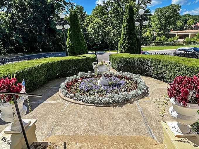 Victorian gardens where every plant knows its place and looks better than your entire landscaping budget.