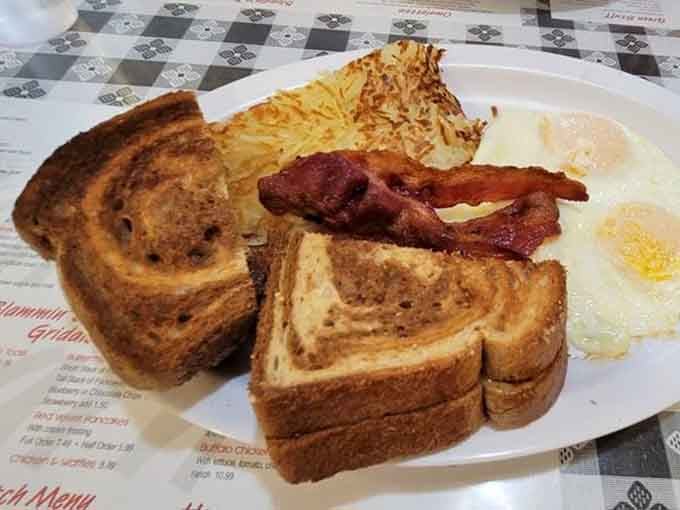 Hash browns the size of dinner plates, perfectly golden toast, and eggs cooked just right: breakfast done properly.