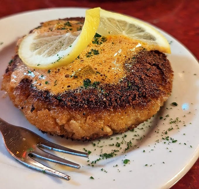 Golden, crispy perfection topped with lemon slices that promise bright, fresh flavors in every single bite you take.