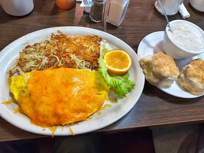 Cheese-blanketed omelets and crispy hash browns served with biscuits so fluffy they practically hover above the plate.