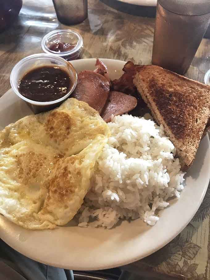 The Hawaiian breakfast plate: where eggs, Portuguese sausage, and rice come together in a harmony that makes boy bands look dysfunctional.