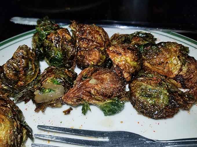 The Brussels sprouts that launched a thousand road trips—caramelized to perfection and worth every mile of Kentucky highway.