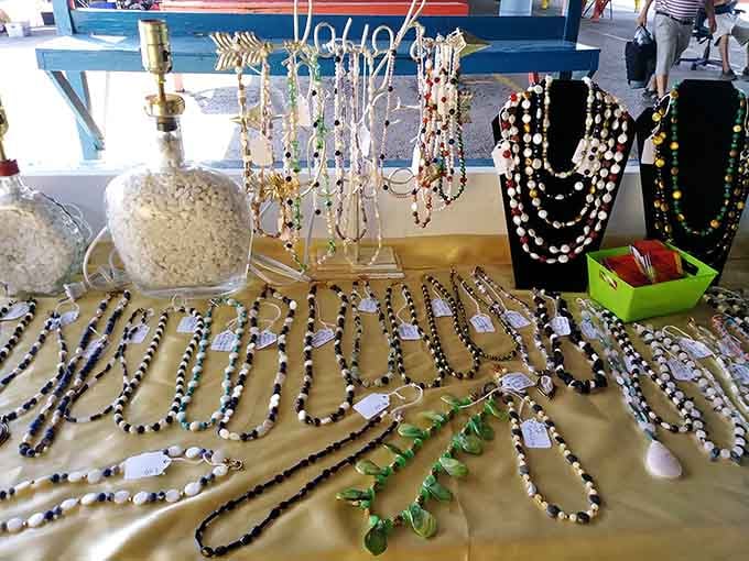 Handcrafted jewelry displays that prove someone's been stringing beads with serious dedication and an eye for color coordination.