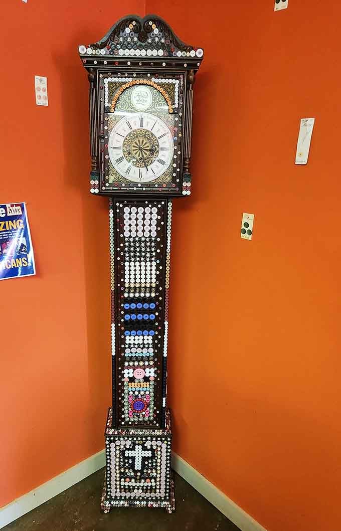 Even time itself gets the button treatment with this magnificent grandfather clock standing guard inside.