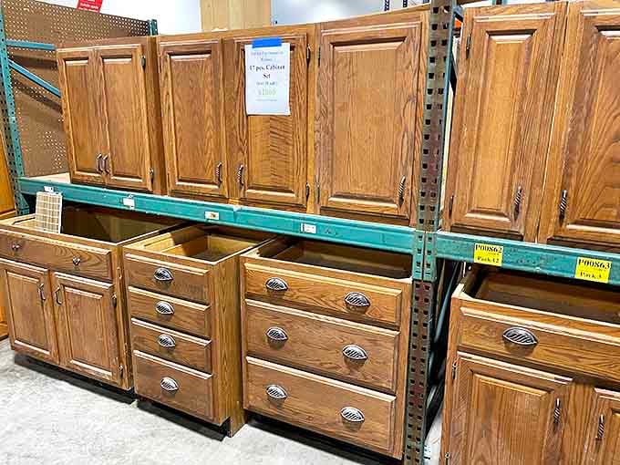 Solid oak cabinets that would cost a fortune new sit patiently waiting to transform someone's kitchen dreams into reality.