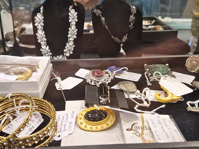 Estate jewelry that's seen more glamorous evenings than most of us will in a lifetime, sparkling patiently.