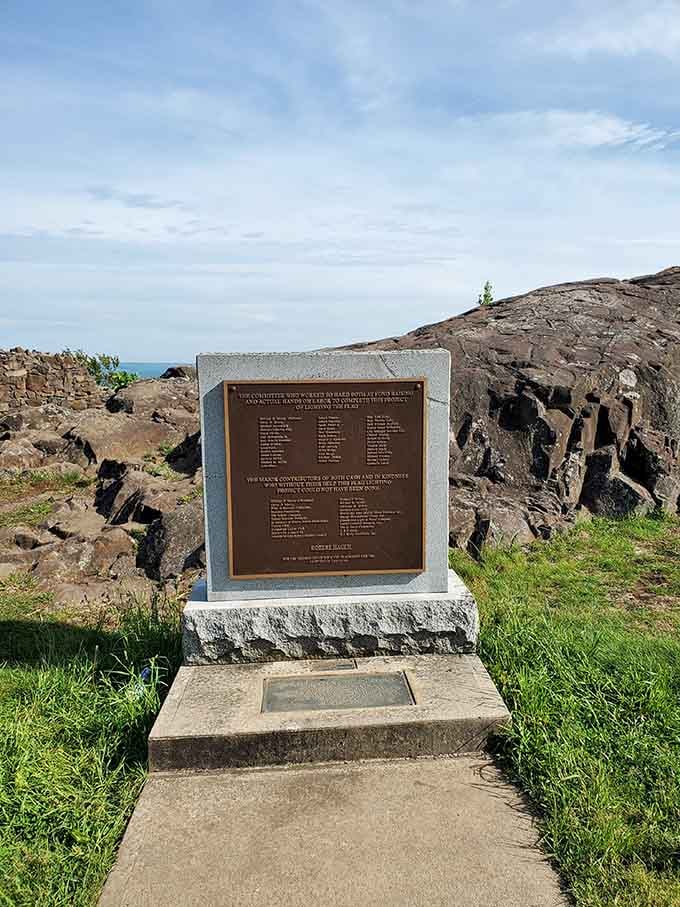 History carved in stone, honoring those who made this mountaintop marvel possible for future generations.