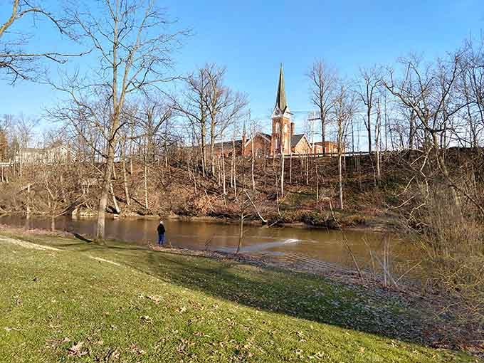 The Chagrin River meanders peacefully here, offering quiet moments away from the falls' dramatic performance just upstream.