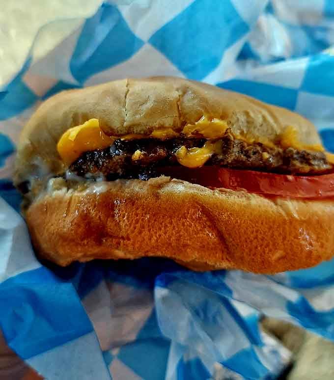 Behold the cheeseburger in its natural habitat&mdash;simple, honest, and unapologetically delicious. No foodie hashtags required, just pure satisfaction between two buns.