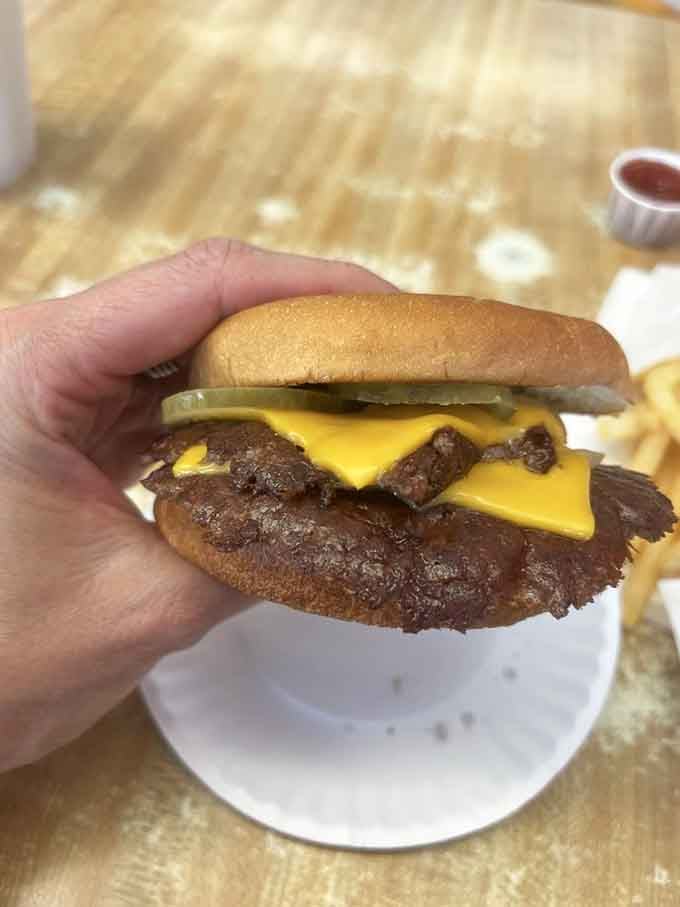 This double cheeseburger with pickles proves that sometimes the best things in life are flat, greasy, and completely unpretentious.
