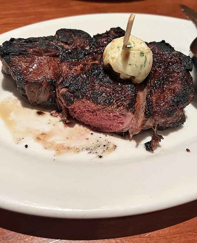 That bone-in ribeye with herb butter proves that sometimes the classics don't need improving, just proper execution.