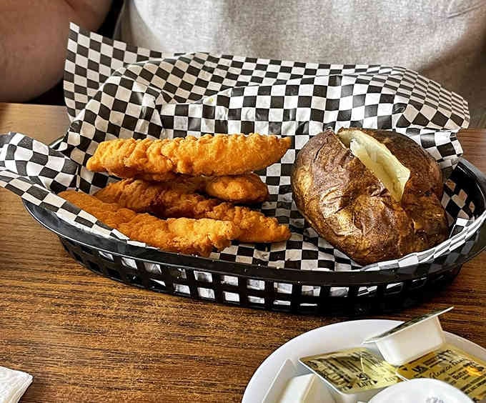Golden fried chicken strips that could make a vegetarian reconsider their life choices, served with style.