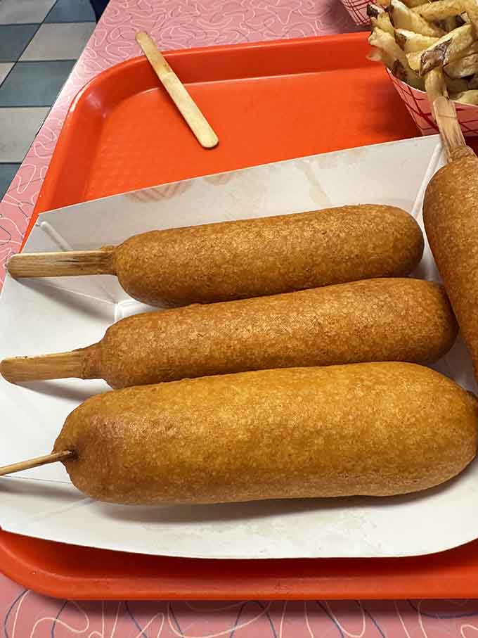 Golden-brown perfection on a stick, these Cozy Dogs make every gas station corn dog weep with shame.