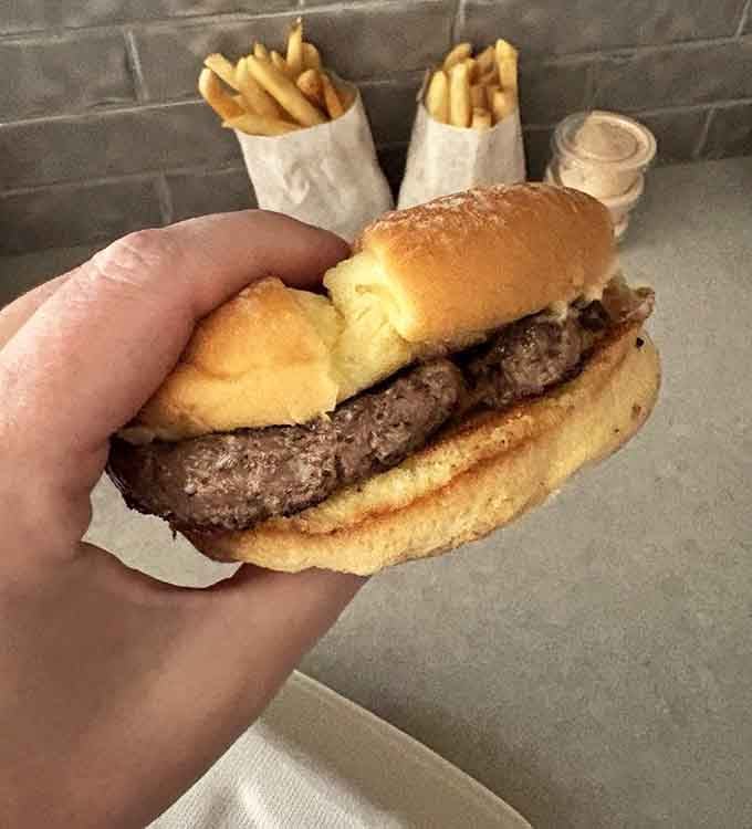 Golden perfection meets melted cheese on a soft bun, proof that some recipes don't need improving for decades.