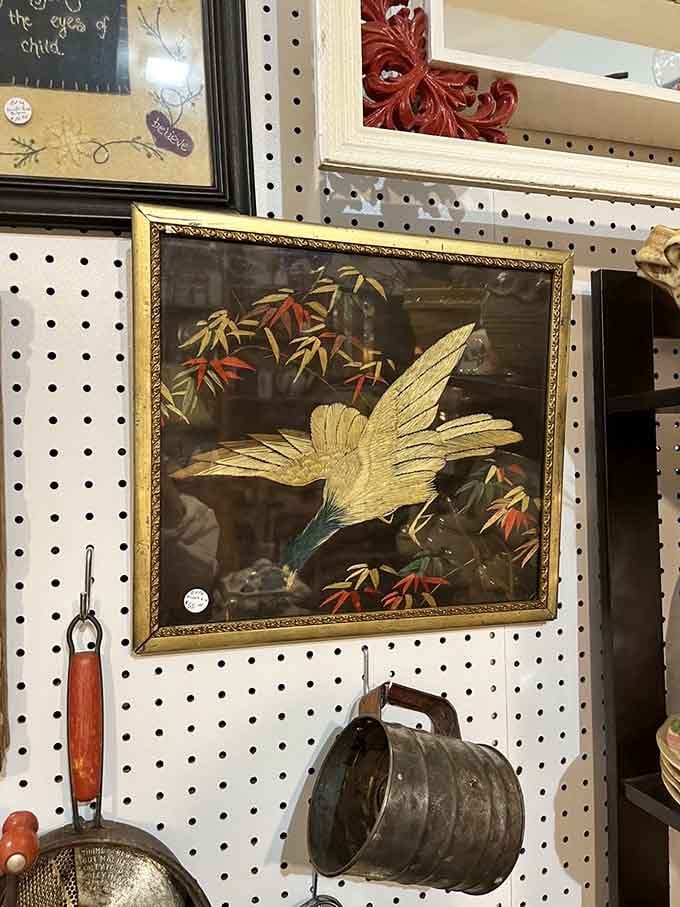 This golden-framed bird painting radiates old-world elegance, the kind your grandmother would've hung in her best parlor.