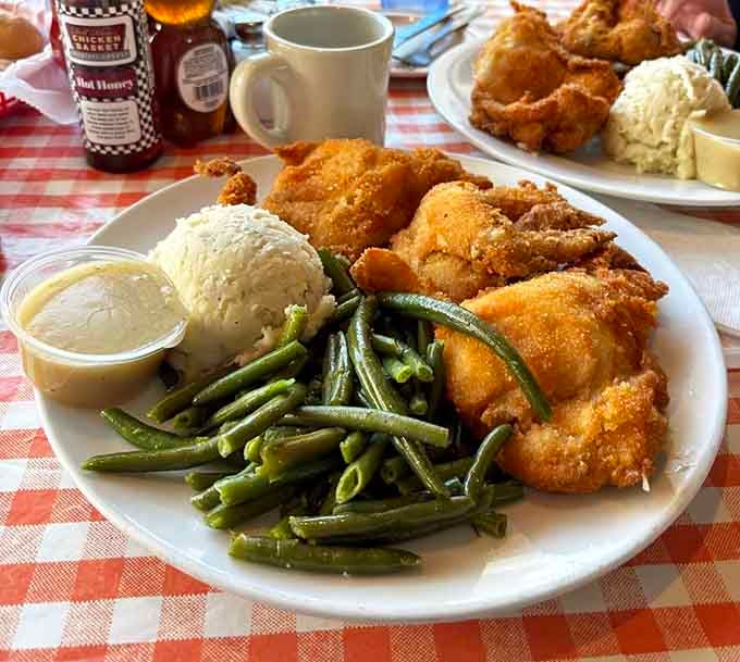 Golden, crispy, and glistening with promise, this is what fried chicken dreams are made of, folks.